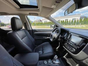 Black Mitsubishi Outlander 2013 in Vilnius, with an engine capacity of 2.00 L and mileage of 278 thousand km for 7650 €, photo 39 on AUTOMOTO.COM.LV