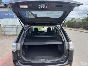 Black Mitsubishi Outlander 2013 in Kaunas, with an engine capacity of 2.00 L and mileage of 135 thousand km for 8199 €, photo 6 on AUTOMOTO.COM.LV