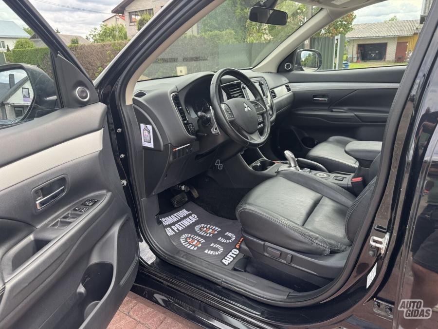 Black Mitsubishi Outlander 2013 in Kaunas, with an engine capacity of 2.00 L and mileage of 135 thousand km for 8199 €, photo 10 on AUTOMOTO.COM.LV