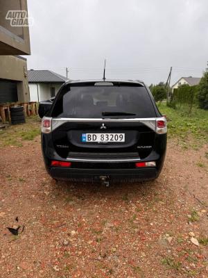 Black Mitsubishi Outlander 2013 in Jonava, with an engine capacity of 2.20 L and mileage of 174 thousand km for 5500 €, photo 3 on AUTOMOTO.COM.LV