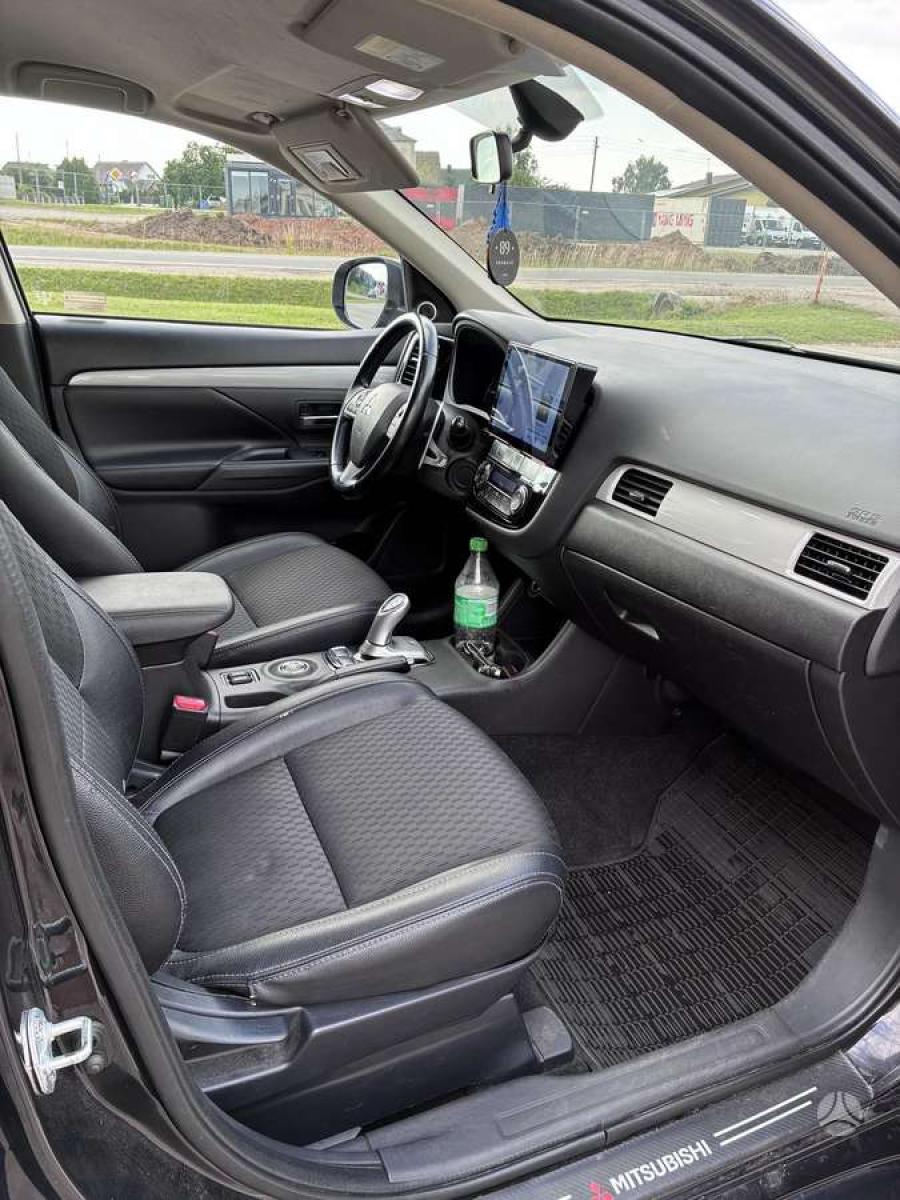 Melns Mitsubishi Outlander 2013 Kauņa, ar dzinēja tilpumu 2.00 L un nobraukumu 287 tūkst. km par 7000 €, foto 9 vietnē AUTOMOTO.COM.LV