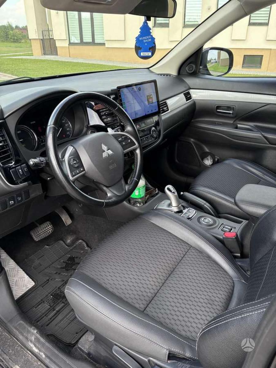 Melns Mitsubishi Outlander 2013 Kauņa, ar dzinēja tilpumu 2.00 L un nobraukumu 287 tūkst. km par 7000 €, foto 10 vietnē AUTOMOTO.COM.LV
