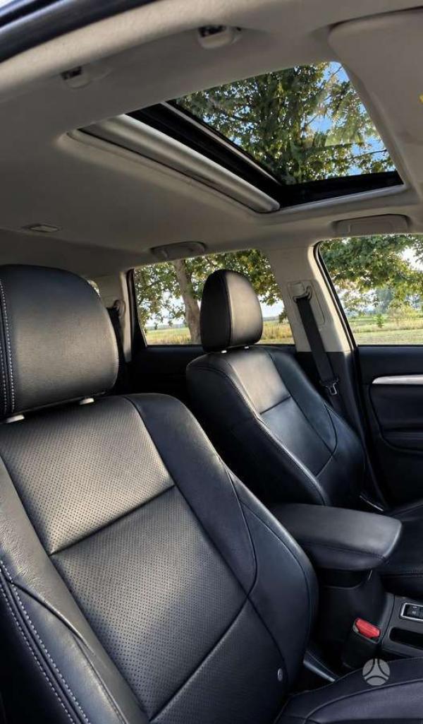 Black Mitsubishi Outlander 2013 in Radviliskis, with an engine capacity of 2.00 L and mileage of 155 thousand km for 7950 €, photo 10 on AUTOMOTO.COM.LV