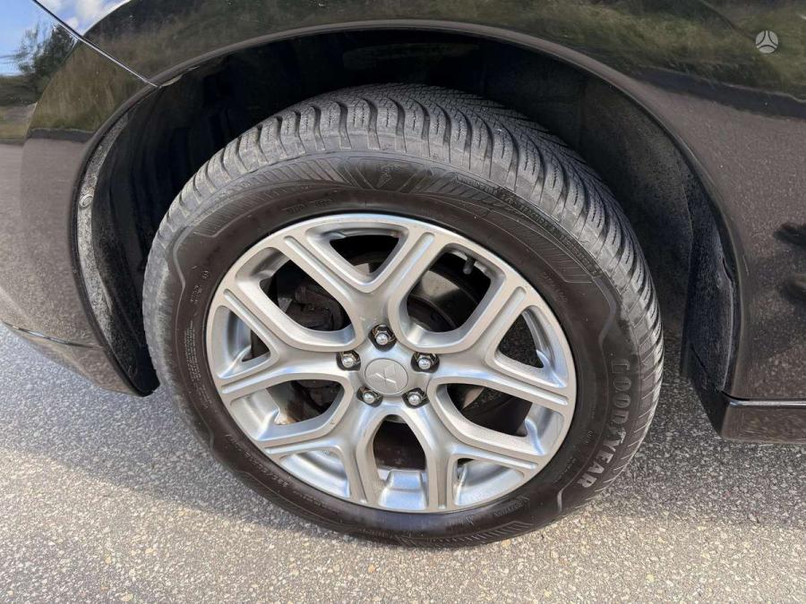 Black Mitsubishi Outlander 2013 in Vilnius, with an engine capacity of 2.00 L and mileage of 197 thousand km for 10450 €, photo 13 on AUTOMOTO.COM.LV