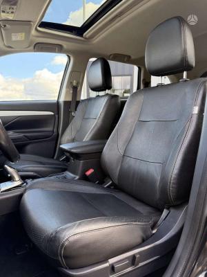 Black Mitsubishi Outlander 2013 in Vilnius, with an engine capacity of 2.00 L and mileage of 197 thousand km for 10450 €, photo 31 on AUTOMOTO.COM.LV