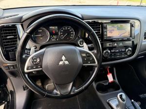 Black Mitsubishi Outlander 2013 in Vilnius, with an engine capacity of 2.00 L and mileage of 197 thousand km for 10450 €, photo 33 on AUTOMOTO.COM.LV