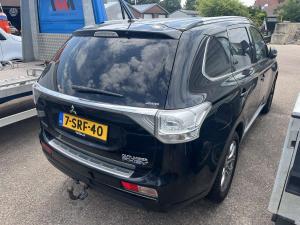 Black Mitsubishi Outlander 2013 in Vilnius, with an engine capacity of 2.00 L and mileage of 197 thousand km for 10450 €, photo 50 on AUTOMOTO.COM.LV