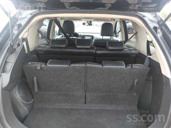 Black Mitsubishi Outlander 2013 in Daugavpils, with an engine capacity of 2.00 L and mileage of 0 thousand km for 7800 €, photo 10 on AUTOMOTO.COM.LV