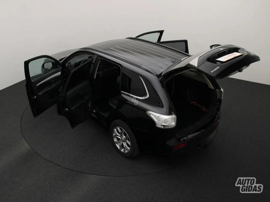 Black Mitsubishi Outlander 2014 in Vilnius, with an engine capacity of 2.00 L and mileage of 204 thousand km for 10199 €, photo 14 on AUTOMOTO.COM.LV