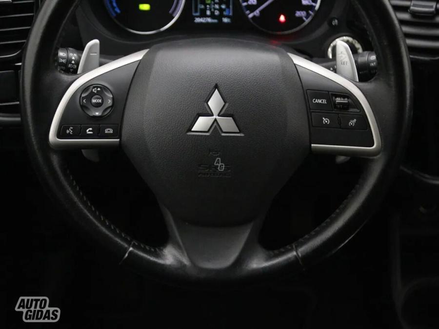 Black Mitsubishi Outlander 2014 in Vilnius, with an engine capacity of 2.00 L and mileage of 204 thousand km for 10199 €, photo 19 on AUTOMOTO.COM.LV