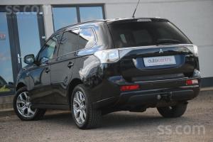 Melns Mitsubishi Outlander 2014 Tukums, ar dzinēja tilpumu 2.00 L un nobraukumu 209 tūkst. km par 8968 €, foto 4 vietnē AUTOMOTO.COM.LV