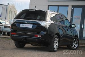 Melns Mitsubishi Outlander 2014 Tukums, ar dzinēja tilpumu 2.00 L un nobraukumu 209 tūkst. km par 8968 €, foto 6 vietnē AUTOMOTO.COM.LV