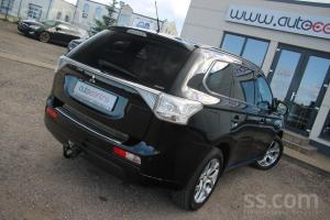 Melns Mitsubishi Outlander 2014 Tukums, ar dzinēja tilpumu 2.00 L un nobraukumu 209 tūkst. km par 8968 €, foto 7 vietnē AUTOMOTO.COM.LV