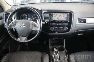 Melns Mitsubishi Outlander 2014 Tukums, ar dzinēja tilpumu 2.00 L un nobraukumu 209 tūkst. km par 8968 €, foto 10 vietnē AUTOMOTO.COM.LV