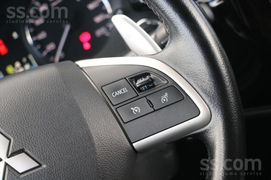 Melns Mitsubishi Outlander 2014 Tukums, ar dzinēja tilpumu 2.00 L un nobraukumu 209 tūkst. km par 8968 €, foto 22 vietnē AUTOMOTO.COM.LV