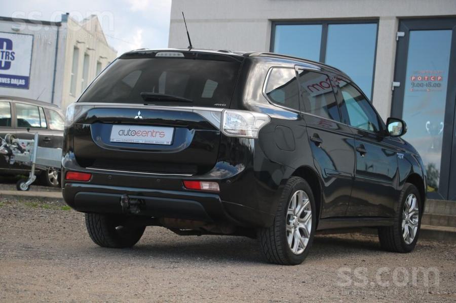 Melns Mitsubishi Outlander 2014 Tukums, ar dzinēja tilpumu 2.00 L un nobraukumu 209 tūkst. km par 8968 €, foto 29 vietnē AUTOMOTO.COM.LV