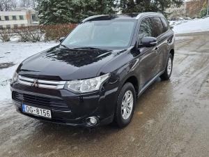 Black Mitsubishi Outlander 2014 in Jekabpils, with an engine capacity of 2.20 L and mileage of 230 thousand km for 8490 €, photo 3 on AUTOMOTO.COM.LV