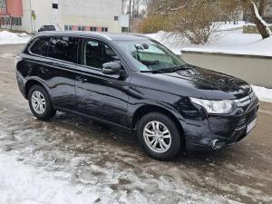 Black Mitsubishi Outlander 2014 in Jekabpils, with an engine capacity of 2.20 L and mileage of 230 thousand km for 8490 €, photo 6 on AUTOMOTO.COM.LV