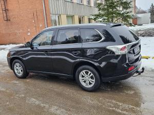 Black Mitsubishi Outlander 2014 in Jekabpils, with an engine capacity of 2.20 L and mileage of 230 thousand km for 8490 €, photo 12 on AUTOMOTO.COM.LV