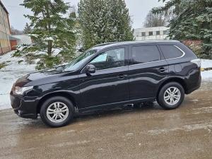 Black Mitsubishi Outlander 2014 in Jekabpils, with an engine capacity of 2.20 L and mileage of 230 thousand km for 8490 €, photo 13 on AUTOMOTO.COM.LV