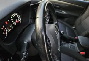 Black Mitsubishi Outlander 2014 in Jekabpils, with an engine capacity of 2.20 L and mileage of 230 thousand km for 8490 €, photo 18 on AUTOMOTO.COM.LV
