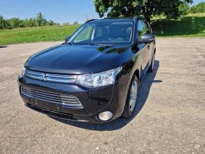 Black Mitsubishi Outlander 2014 in Kaunas, with an engine capacity of 2.00 L and mileage of 312 thousand km for 7450 €, photo  on AUTOMOTO.COM.LV