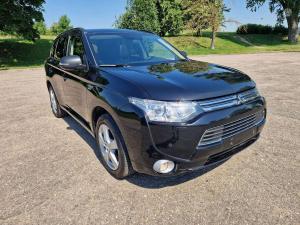 Black Mitsubishi Outlander 2014 in Kaunas, with an engine capacity of 2.00 L and mileage of 312 thousand km for 7450 €, photo 4 on AUTOMOTO.COM.LV