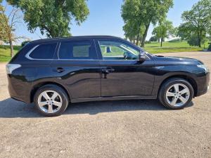 Black Mitsubishi Outlander 2014 in Kaunas, with an engine capacity of 2.00 L and mileage of 312 thousand km for 7450 €, photo 5 on AUTOMOTO.COM.LV
