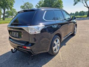 Black Mitsubishi Outlander 2014 in Kaunas, with an engine capacity of 2.00 L and mileage of 312 thousand km for 7450 €, photo 6 on AUTOMOTO.COM.LV