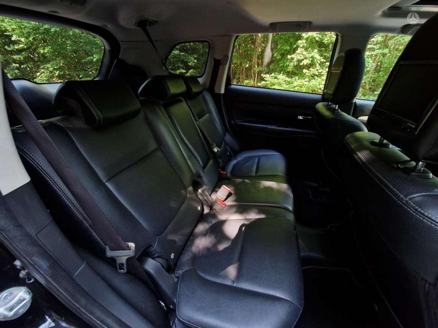 Black Mitsubishi Outlander 2014 in Kaunas, with an engine capacity of 2.00 L and mileage of 312 thousand km for 7450 €, photo 16 on AUTOMOTO.COM.LV
