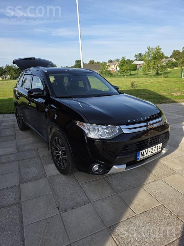 Melns Mitsubishi Outlander 2014 Talsi, ar dzinēja tilpumu 2.20 L un nobraukumu 252 tūkst. km par 4000 €, foto 1 vietnē AUTOMOTO.COM.LV