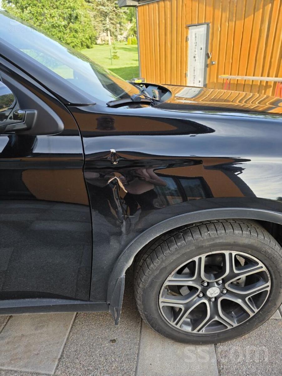 Melns Mitsubishi Outlander 2014 Talsi, ar dzinēja tilpumu 2.20 L un nobraukumu 252 tūkst. km par 4000 €, foto 3 vietnē AUTOMOTO.COM.LV