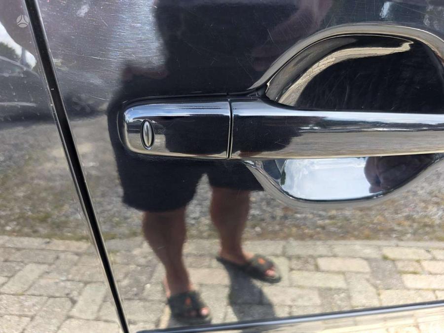 Black Mitsubishi Outlander 2014 in Vilnius, with an engine capacity of 2.00 L and mileage of 210 thousand km for 9500 €, photo 13 on AUTOMOTO.COM.LV
