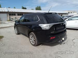Melns Mitsubishi Outlander 2014 Tallina, ar dzinēja tilpumu 2.00 L un nobraukumu 187 tūkst. km par 9900 €, foto 4 vietnē AUTOMOTO.COM.LV