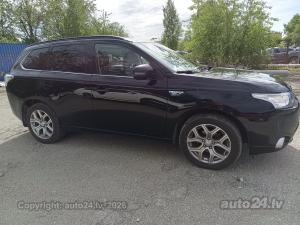 Melns Mitsubishi Outlander 2014 Tallina, ar dzinēja tilpumu 2.00 L un nobraukumu 187 tūkst. km par 9900 €, foto 6 vietnē AUTOMOTO.COM.LV