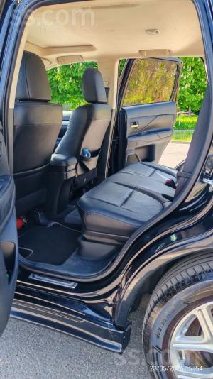 Melns Mitsubishi Outlander 2014 Rīga, ar dzinēja tilpumu 2.00 L un nobraukumu 258 tūkst. km par 8800 €, foto 12 vietnē AUTOMOTO.COM.LV