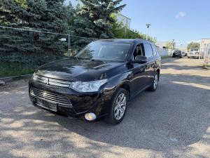 Black Mitsubishi Outlander 2014 in Marijampole, with an engine capacity of 2.00 L and mileage of 245 thousand km for 4350 €, photo  on AUTOMOTO.COM.LV