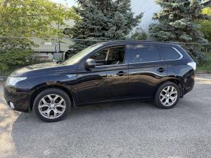 Black Mitsubishi Outlander 2014 in Marijampole, with an engine capacity of 2.00 L and mileage of 245 thousand km for 4350 €, photo 7 on AUTOMOTO.COM.LV