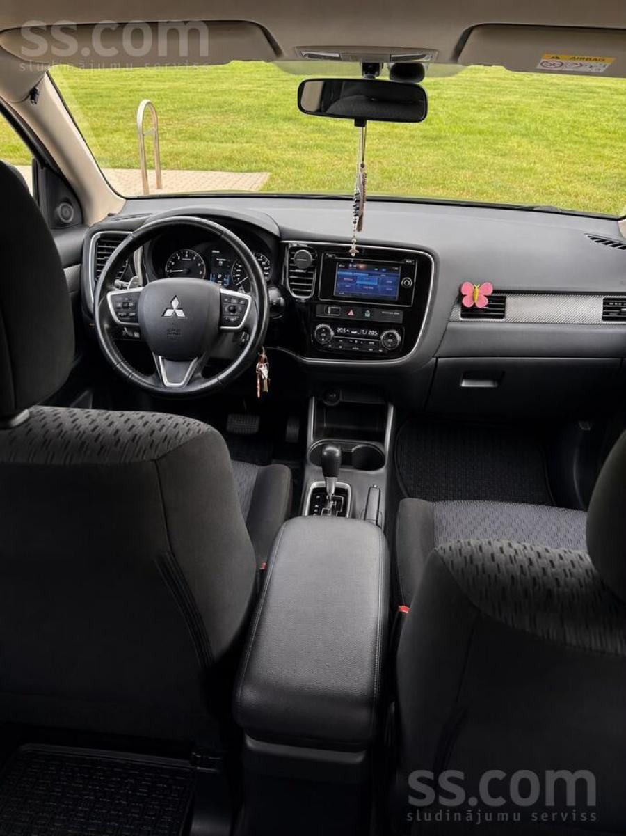 Melns Mitsubishi Outlander 2014 Rīga, ar dzinēja tilpumu 2.00 L un nobraukumu 152 tūkst. km par 9200 €, foto 7 vietnē AUTOMOTO.COM.LV