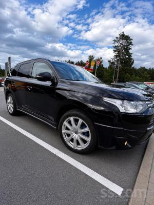 Melns Mitsubishi Outlander 2014 Rīga, ar dzinēja tilpumu 2.00 L un nobraukumu 152 tūkst. km par 9200 €, foto 8 vietnē AUTOMOTO.COM.LV