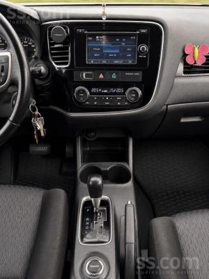 Melns Mitsubishi Outlander 2014 Rīga, ar dzinēja tilpumu 2.00 L un nobraukumu 152 tūkst. km par 9200 €, foto 9 vietnē AUTOMOTO.COM.LV