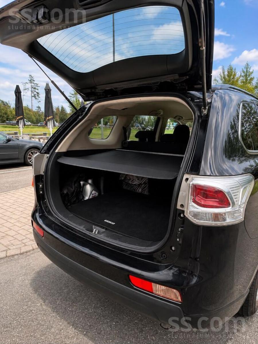 Melns Mitsubishi Outlander 2014 Rīga, ar dzinēja tilpumu 2.00 L un nobraukumu 152 tūkst. km par 9200 €, foto 12 vietnē AUTOMOTO.COM.LV