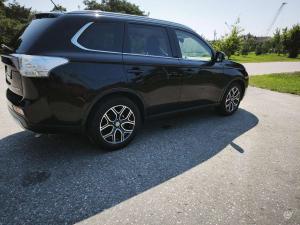 Melns Mitsubishi Outlander 2014 Klaipėda, ar dzinēja tilpumu 2.00 L un nobraukumu 147 tūkst. km par 11000 €, foto 5 vietnē AUTOMOTO.COM.LV