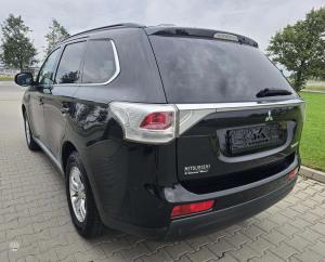 Black Mitsubishi Outlander 2014 in Panevezys, with an engine capacity of 2.00 L and mileage of 303 thousand km for 4999 €, photo 6 on AUTOMOTO.COM.LV