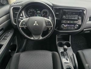 Black Mitsubishi Outlander 2014 in Panevezys, with an engine capacity of 2.00 L and mileage of 303 thousand km for 4999 €, photo 16 on AUTOMOTO.COM.LV