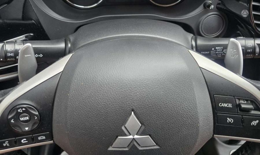 Black Mitsubishi Outlander 2014 in Panevezys, with an engine capacity of 2.00 L and mileage of 303 thousand km for 4999 €, photo 18 on AUTOMOTO.COM.LV