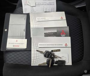 Black Mitsubishi Outlander 2014 in Panevezys, with an engine capacity of 2.00 L and mileage of 303 thousand km for 4999 €, photo 23 on AUTOMOTO.COM.LV