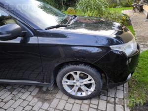 Melns Mitsubishi Outlander 2014 Rīga, ar dzinēja tilpumu 2.00 L un nobraukumu 308 tūkst. km par 4000 €, foto 3 vietnē AUTOMOTO.COM.LV