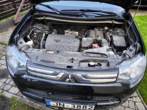 Melns Mitsubishi Outlander 2014 Rīga, ar dzinēja tilpumu 2.00 L un nobraukumu 308 tūkst. km par 4000 €, foto 4 vietnē AUTOMOTO.COM.LV