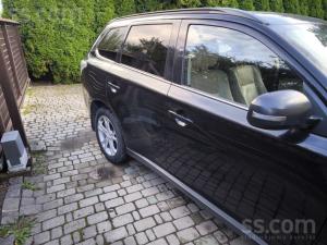 Melns Mitsubishi Outlander 2014 Rīga, ar dzinēja tilpumu 2.00 L un nobraukumu 308 tūkst. km par 4000 €, foto 5 vietnē AUTOMOTO.COM.LV